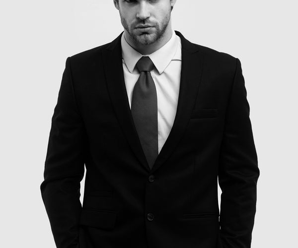 The Timeless Appeal of the Classic Black Suit: Why Every Man Needs One ...